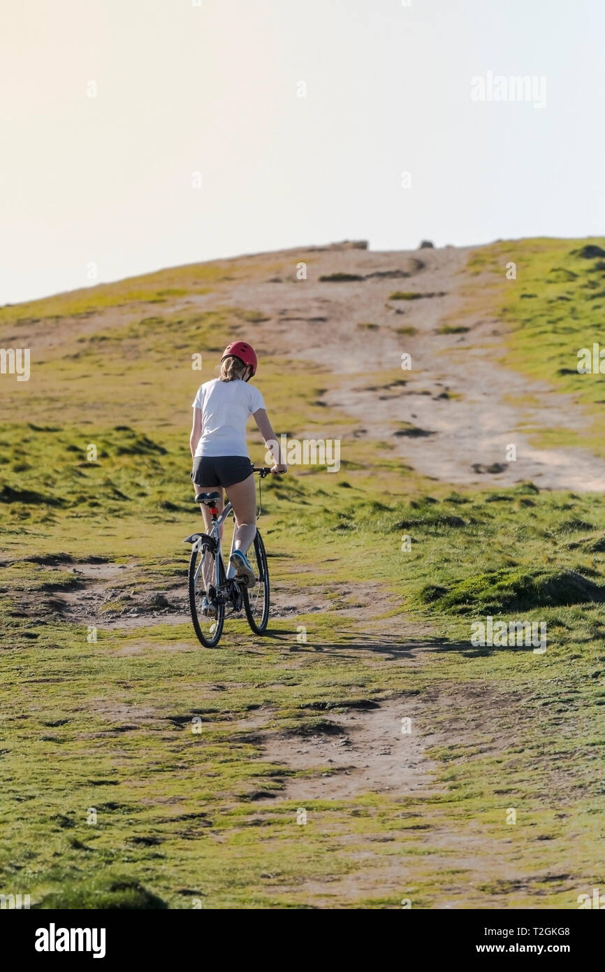 Female riding a bike hi-res stock photography and images - Alamy