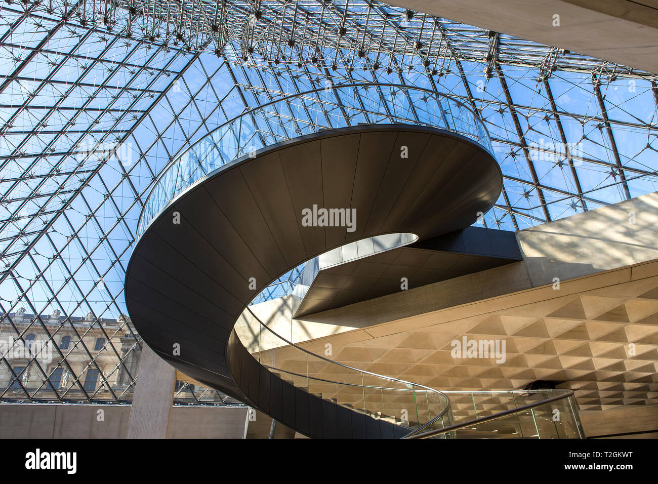 PARIS, FRANCE, MARCH 03, 2017 : staircase in the pyramid at the Louvre ...