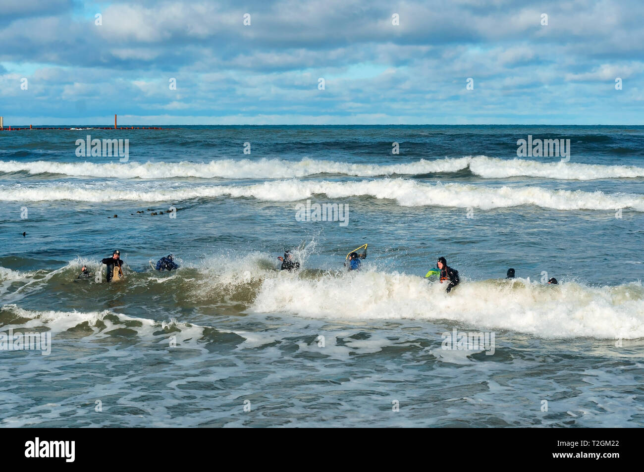 fishing for amber, people catch amber waves, the Baltic sea ...