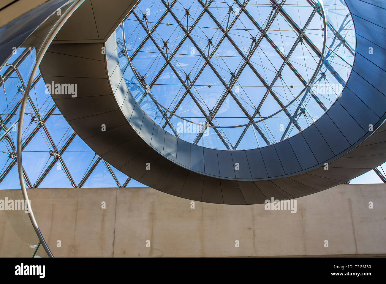 PARIS, FRANCE, MARCH 03, 2017 : staircase in the pyramid at the Louvre ...