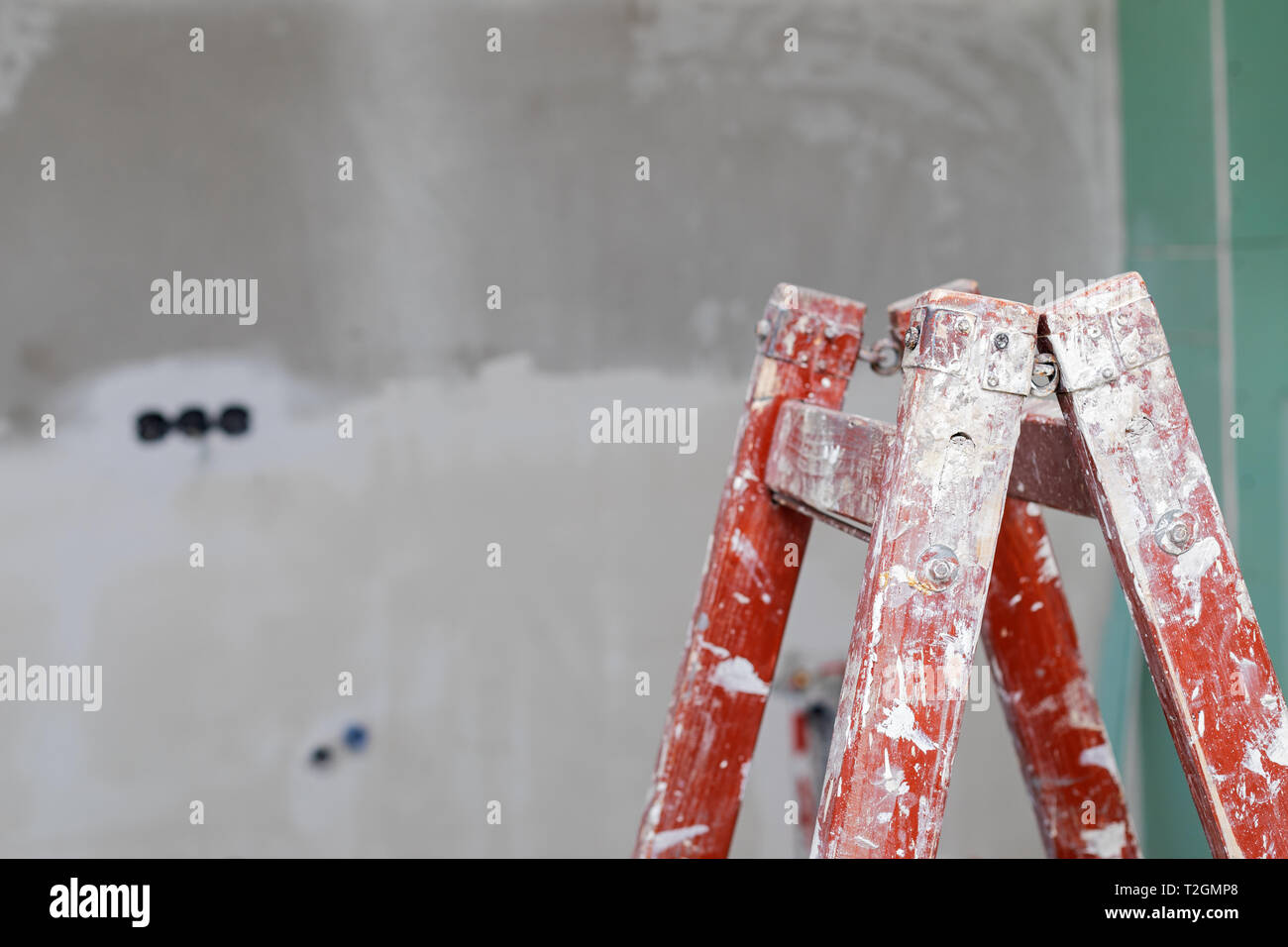 Picture of an unfinished apartment , ladder, concrete walls - new home ...
