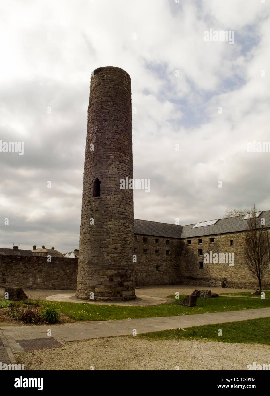 Fine example of one of famous irish round towers in the town of Roscrea ...