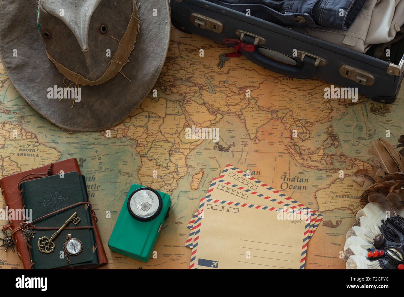 Old map, vintage travel equipment and souvenirs from the travel around ...