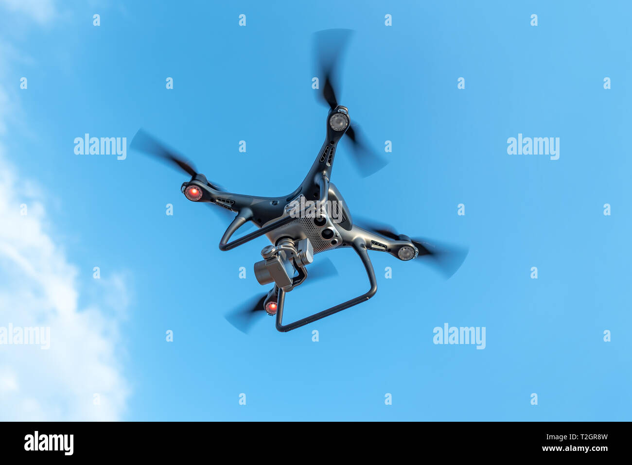 Modern beautiful dark drone in the sky Stock Photo - Alamy