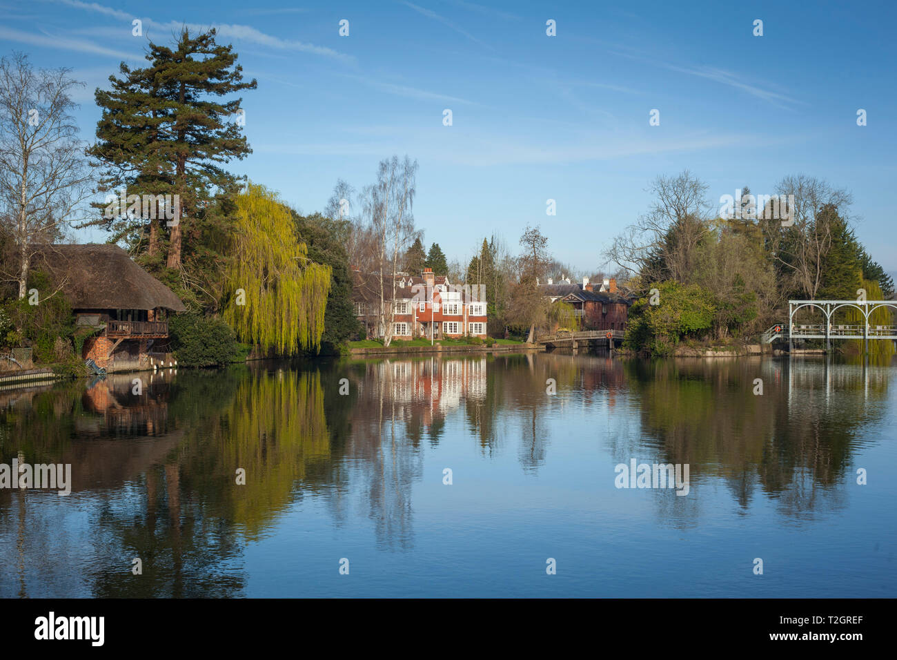 Reflections in the River Thames above the weir at Marsh Lock near ...