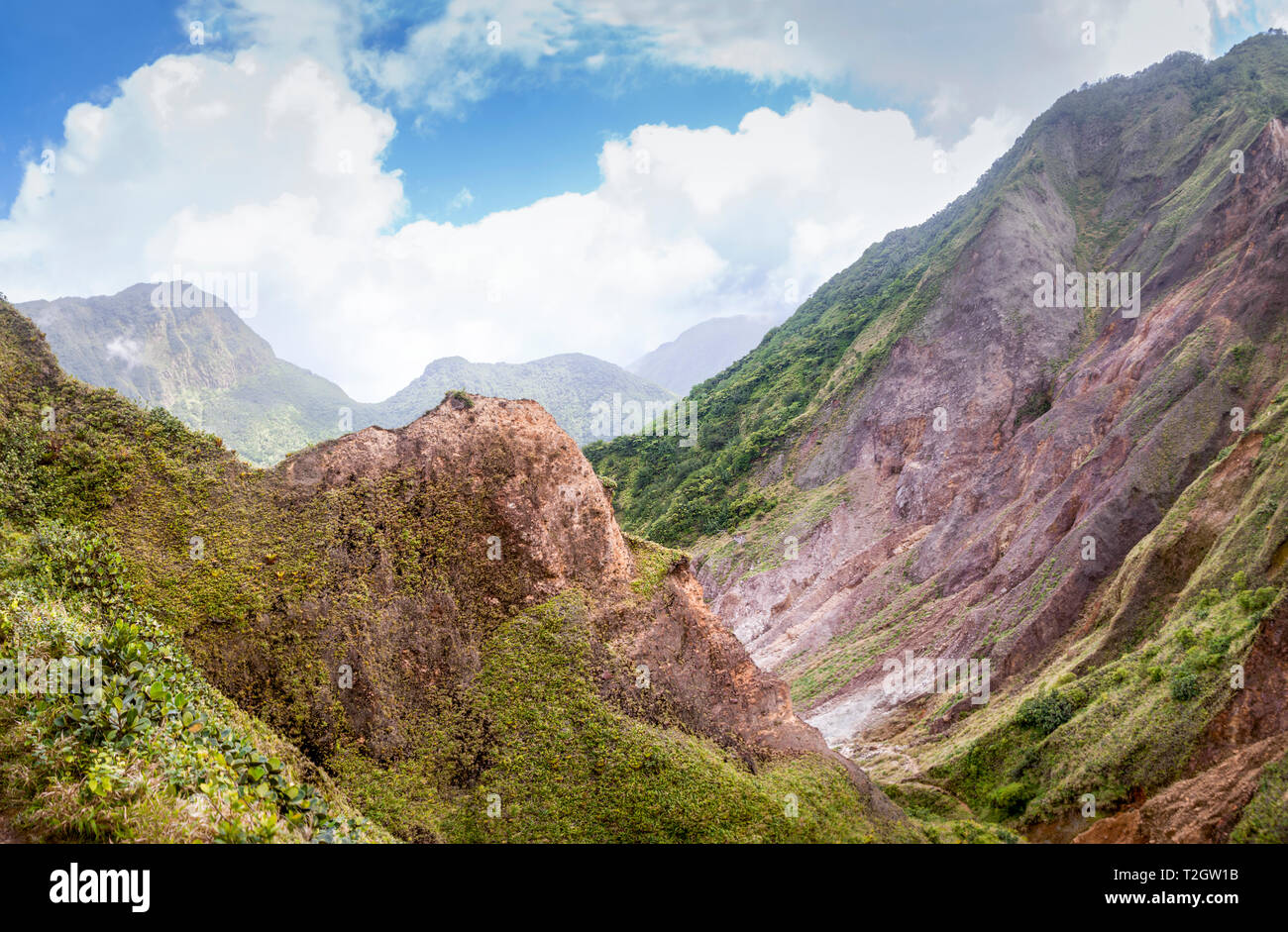 Heavily eroded volcanic tuffs above the sulphur springs Morne Trois ...