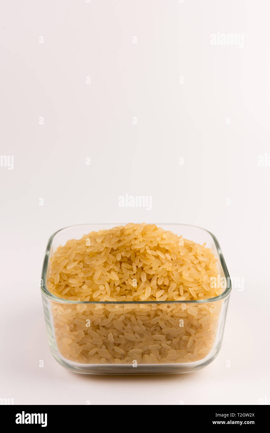 white rice in bowl isolated on white background Stock Photo - Alamy
