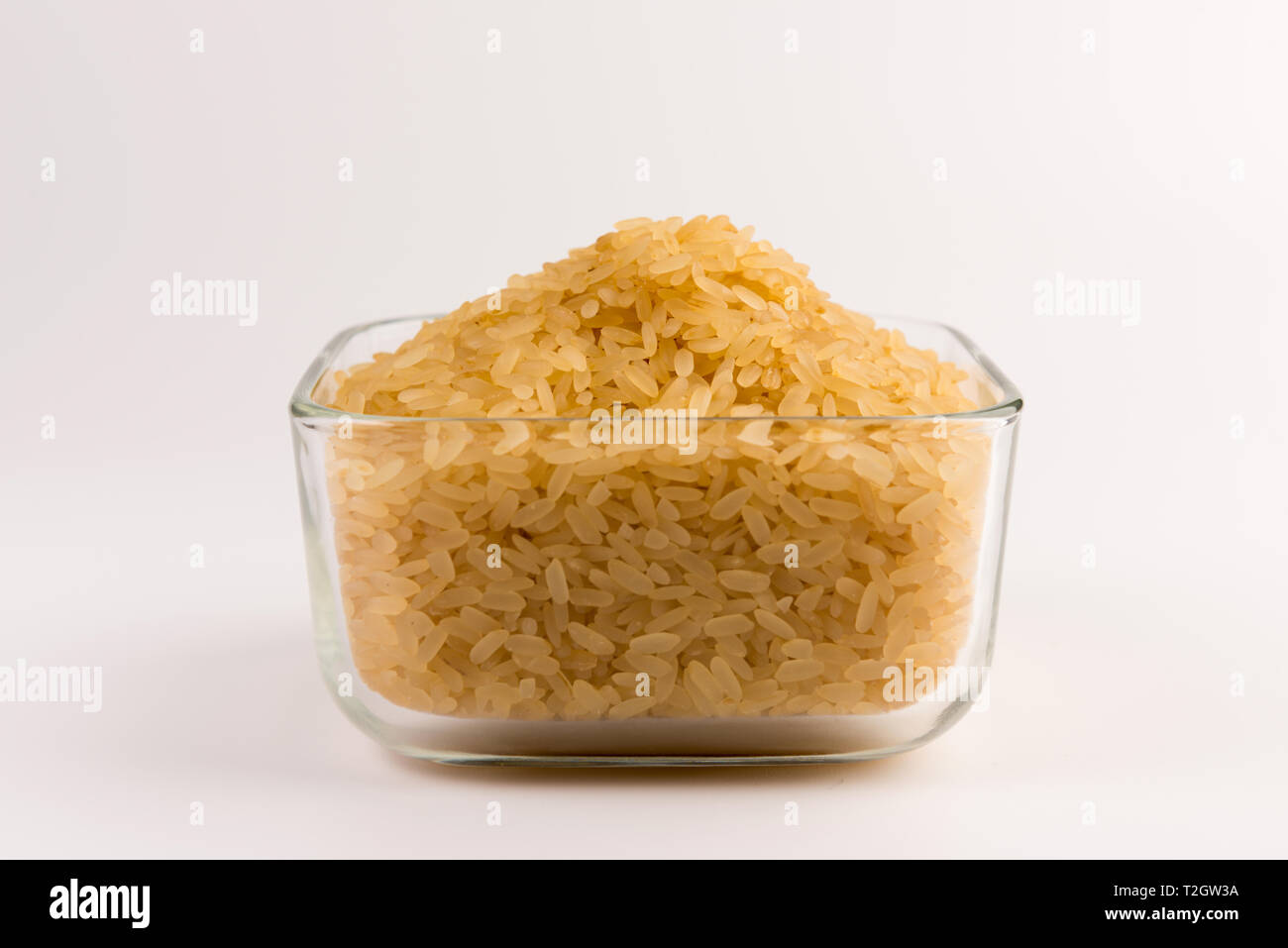 white rice in bowl isolated on white background Stock Photo - Alamy