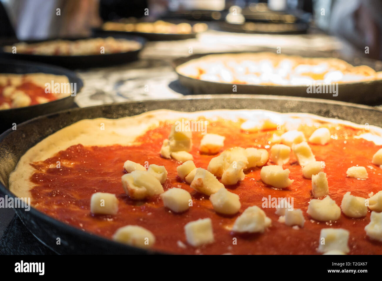 Pizzas in kitchen hi-res stock photography and images - Alamy