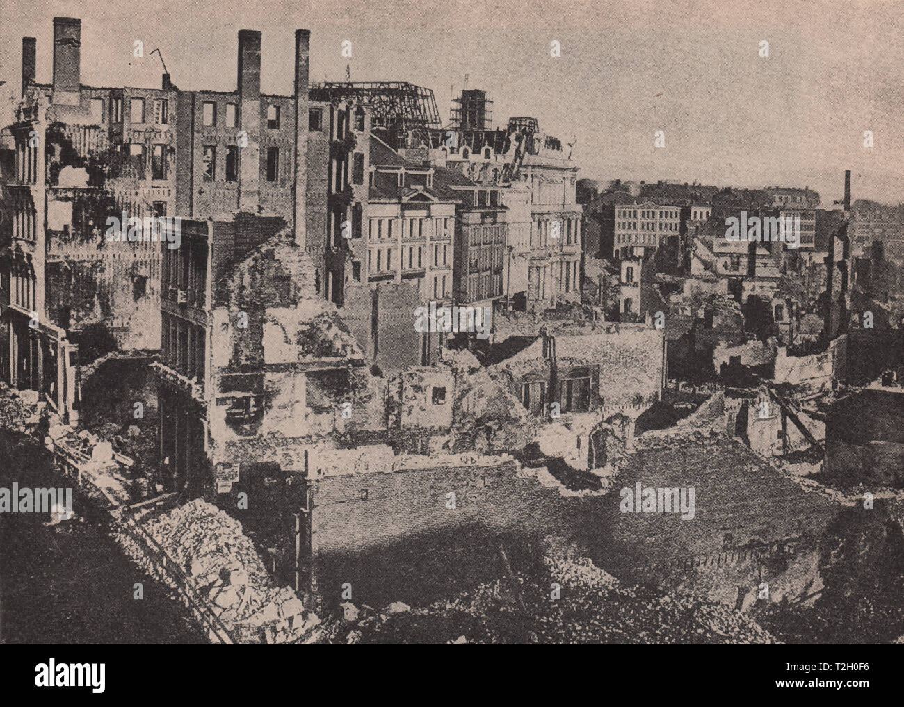 Buildings that were partly destroyed by earthquake & fire. Steel ...