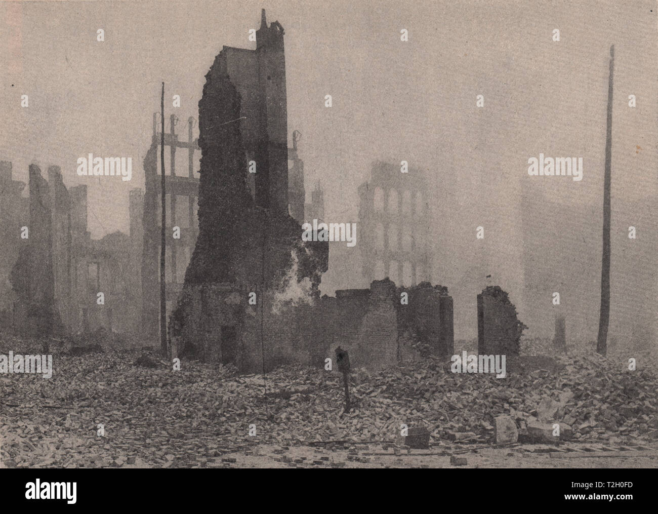 The Photograph pictures the complete Destruction of many buildings in ...