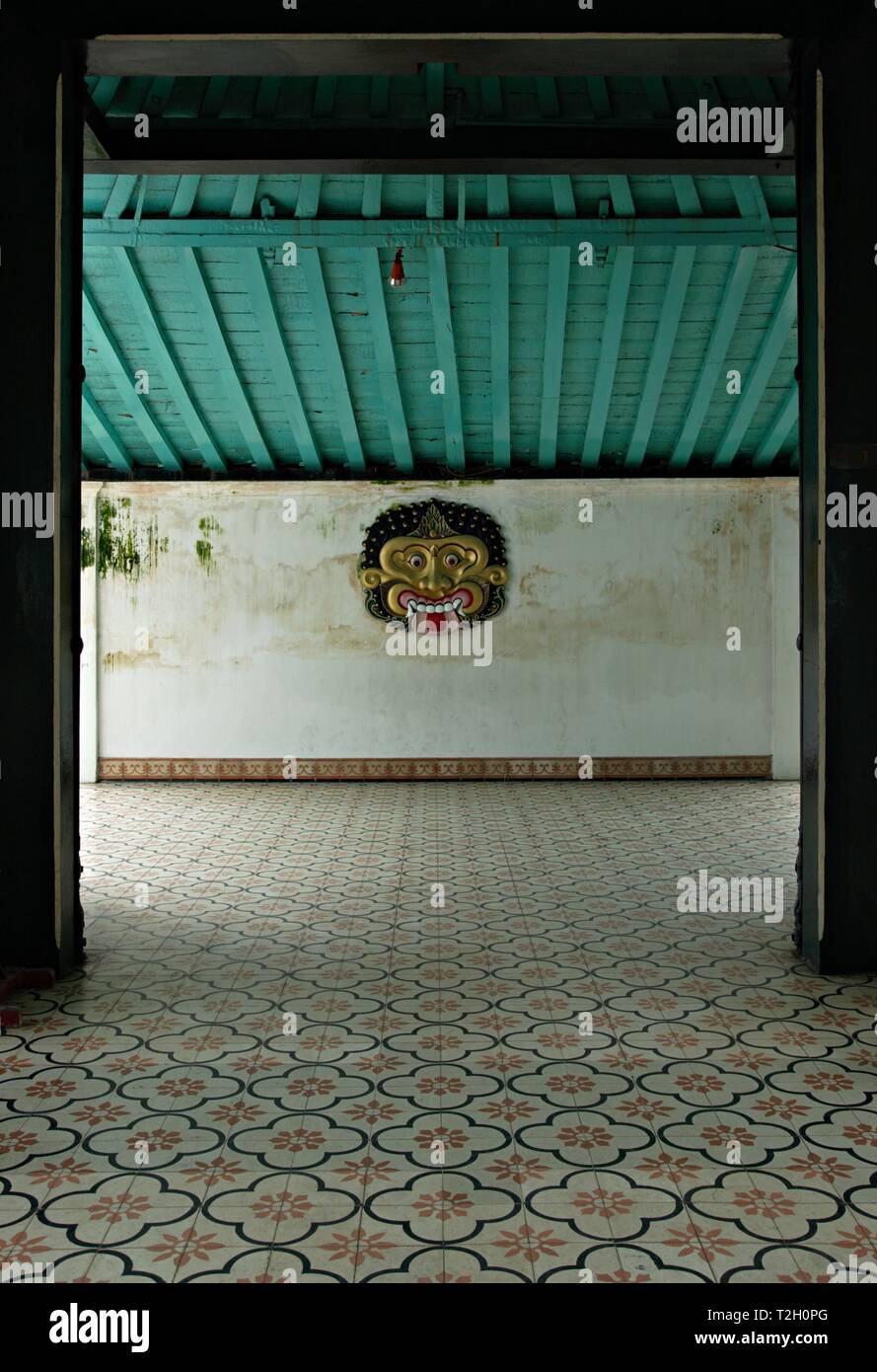 One gateway with traditional decoration inside Keraton Yogyakarta. The ...