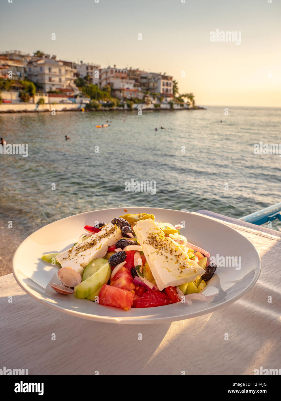 Greek Salad served at a taverna in Skala Marion traditional greek town ...