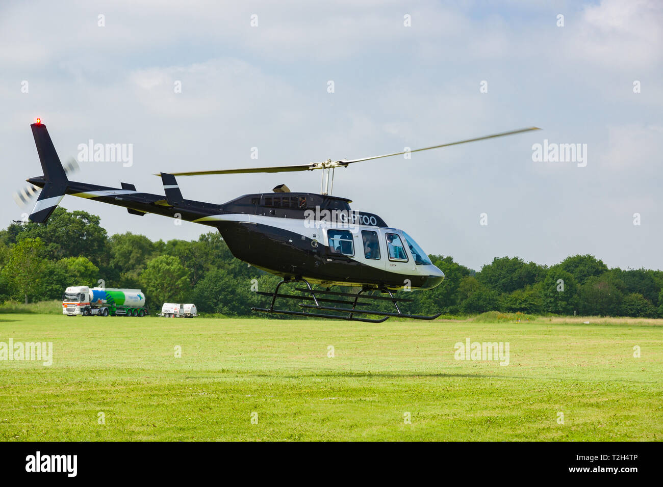 Bell 206L-4 Longranger IV taking off with passengers. A popular light ...