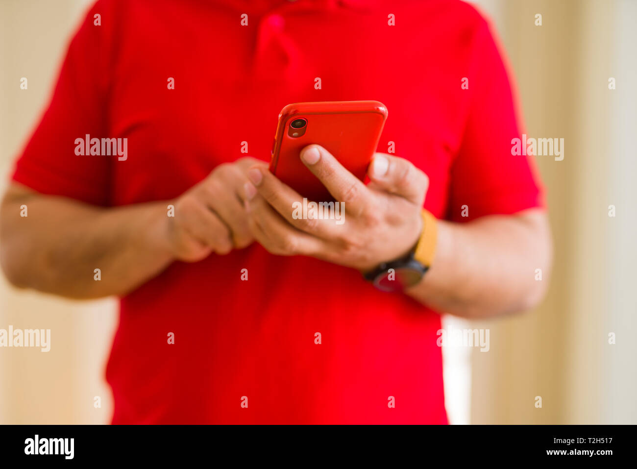 Close up of middle age man hands using smartphone at home Stock Photo ...
