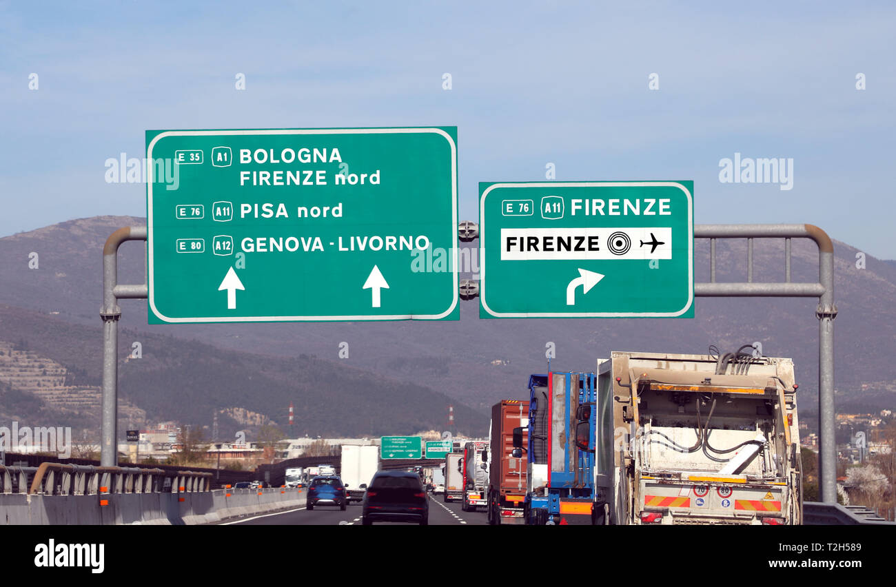 Italian motorway with many indications to main cities such as Bologna ...