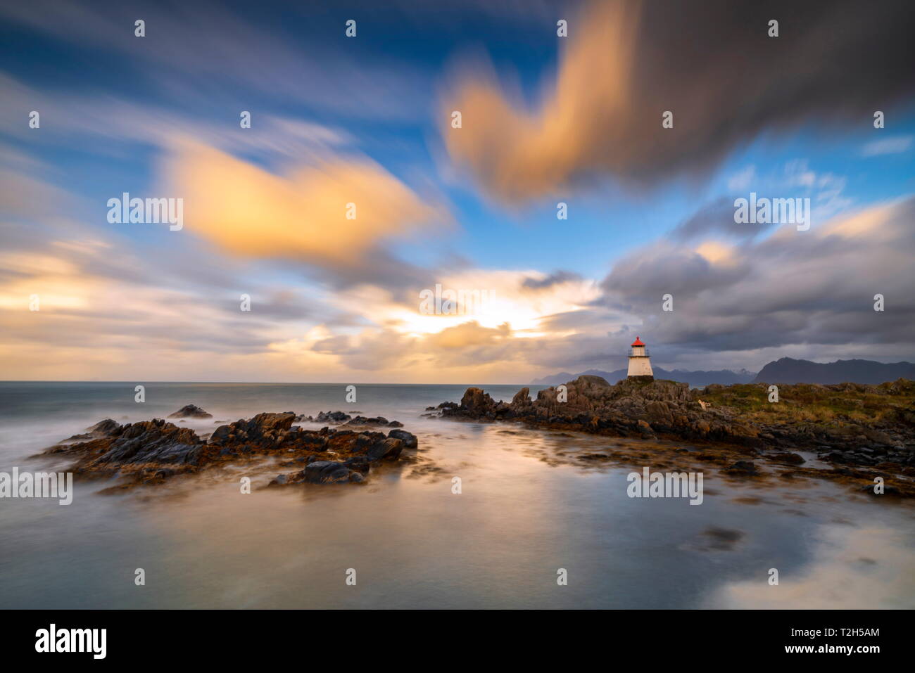 Lighthouse at sunset in Hovsund, Lofoten Islands, Norway, Europe Stock ...