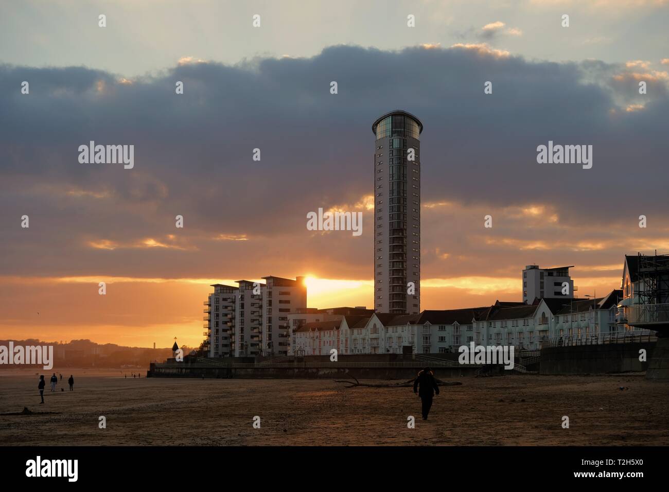 beach sunset and city scape Stock Photo - Alamy