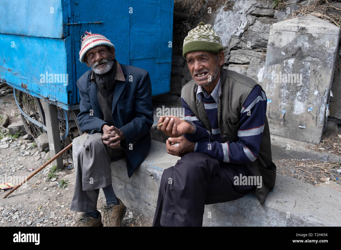 Old men having a conversation Stock Photo - Alamy