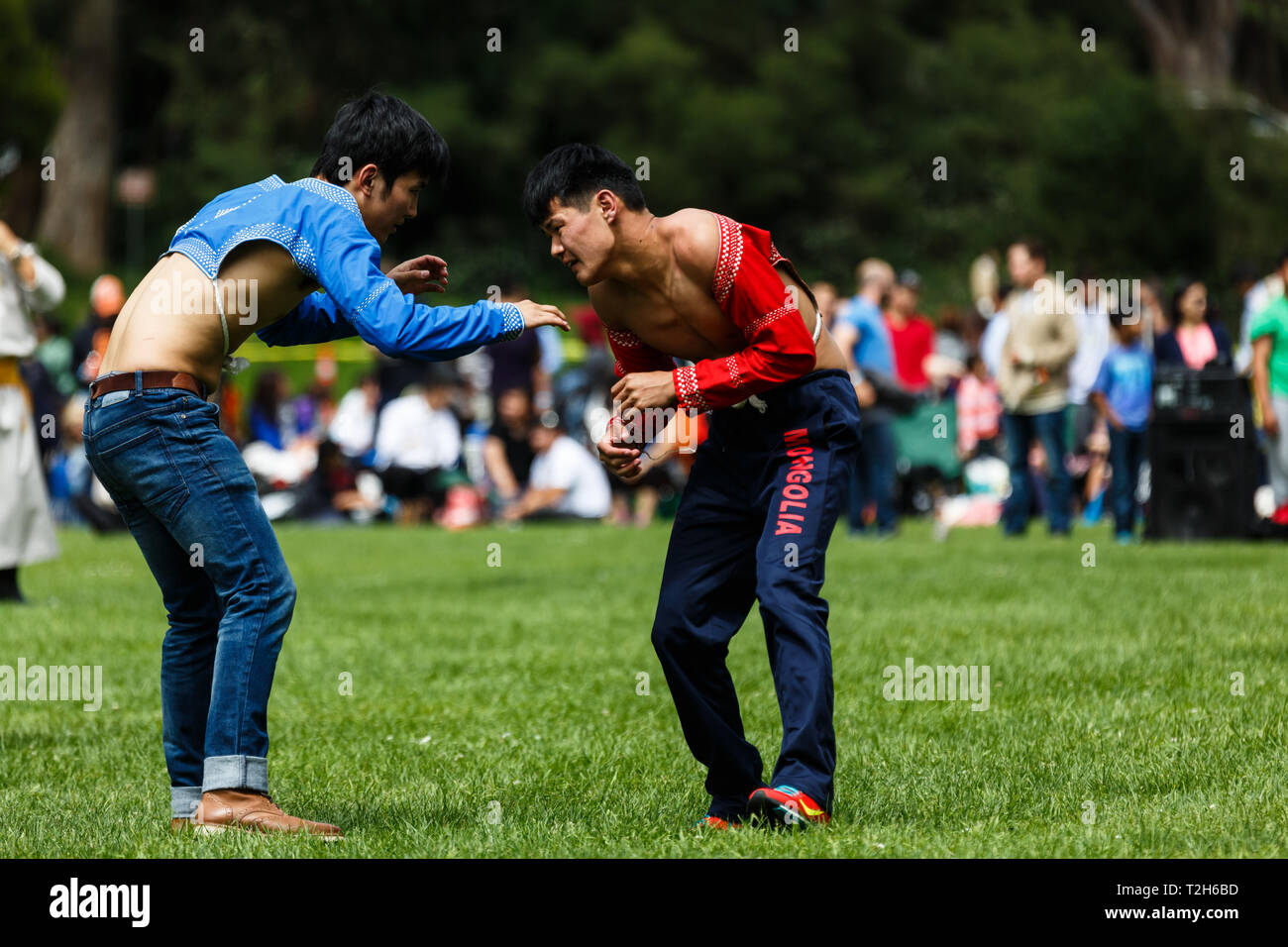 Two wrestlers square off for match in park Stock Photo - Alamy