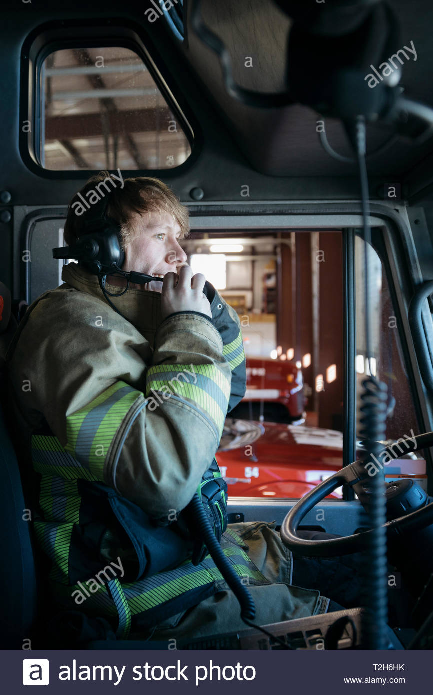 Firefighter driving fire engine hi-res stock photography and images - Alamy