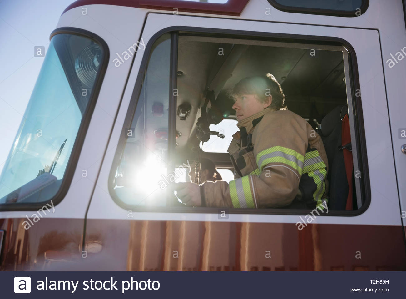 Fire man driving hi-res stock photography and images - Alamy