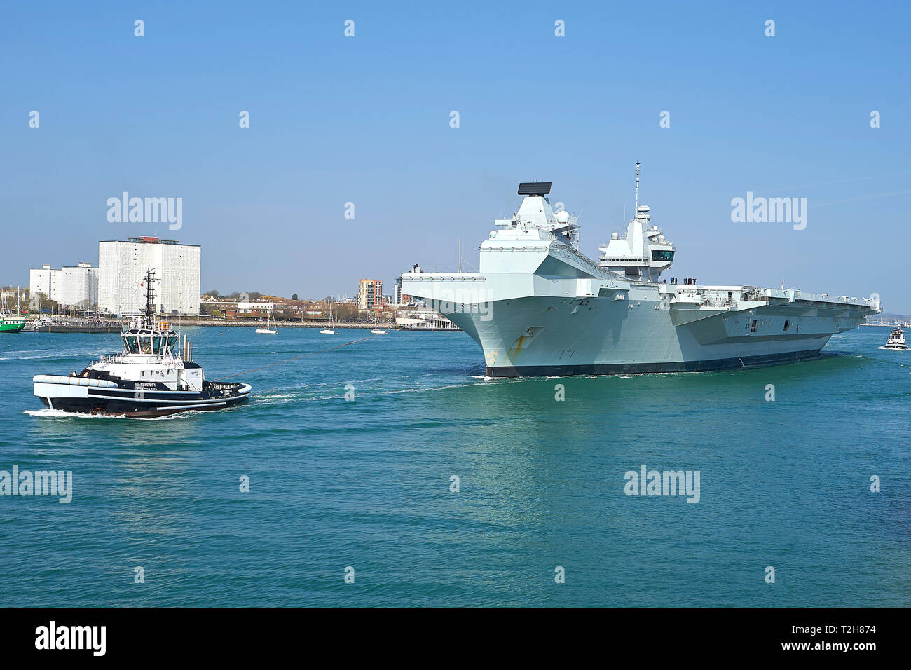 The Royal Navy Aircraft Carrier, HMS QUEEN ELIZABETH, Being Assisted ...