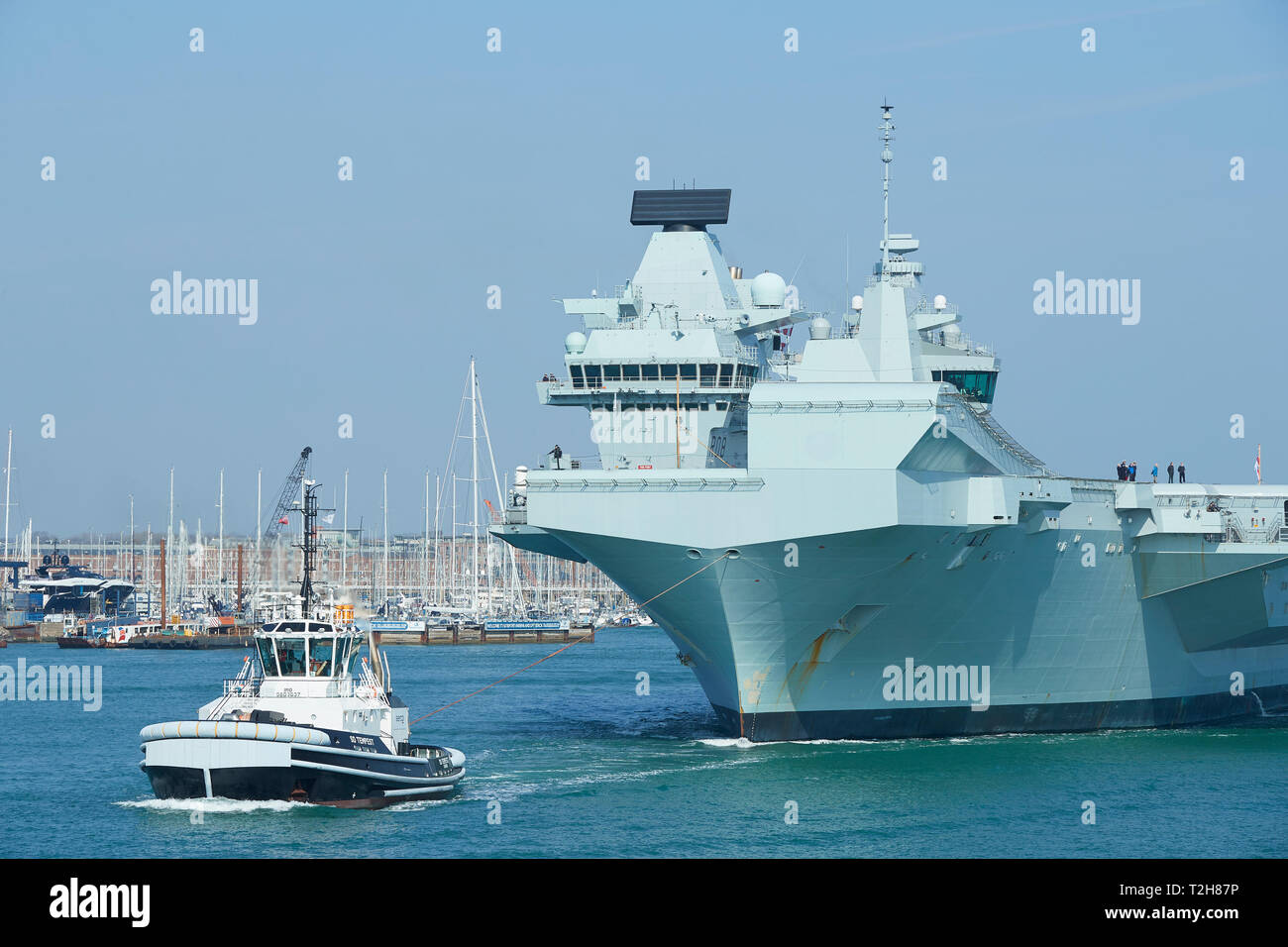 The Royal Navy Aircraft Carrier, HMS QUEEN ELIZABETH, Being Assisted ...