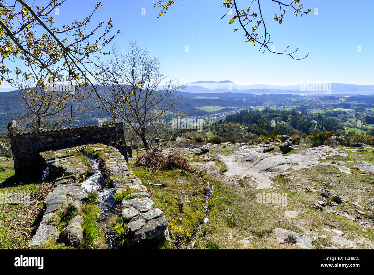 Water mills scattered through the hills in northwestern Spain on the ...
