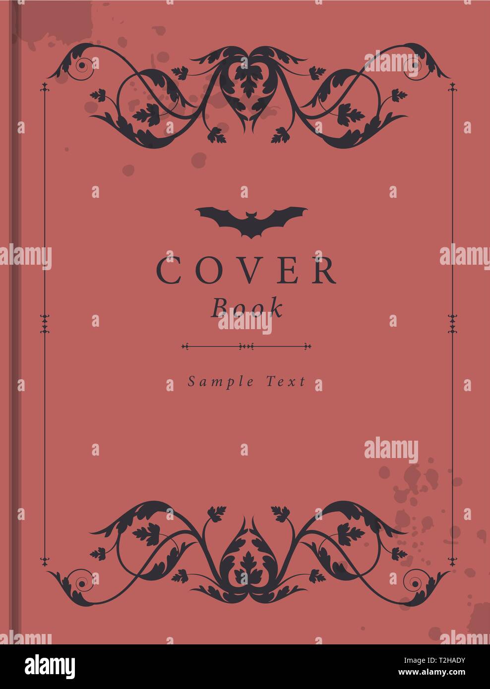 Book cover with antique style ornamental frame, moisture stains and bat ...
