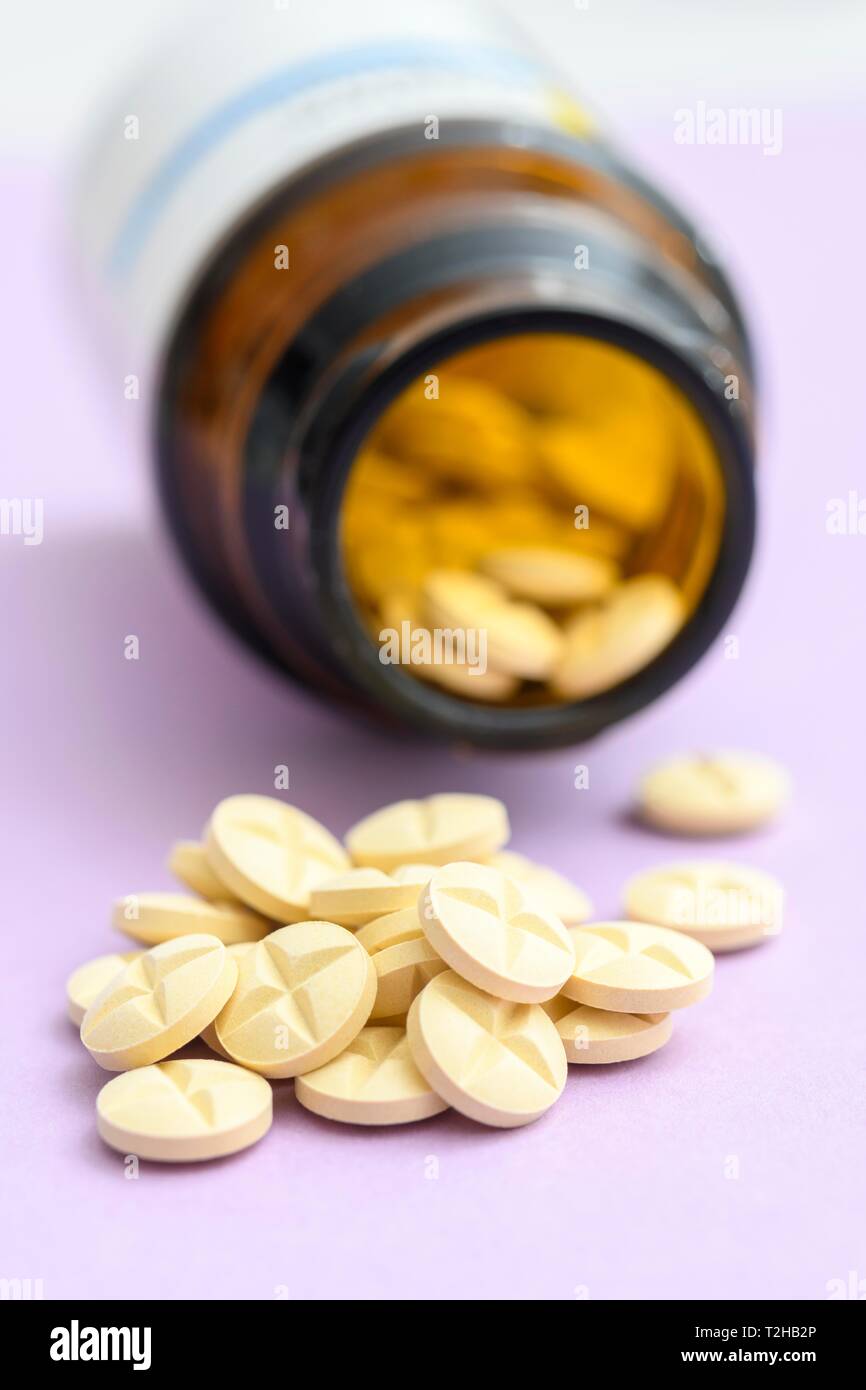 Glass containers and tablets, Germany Stock Photo - Alamy