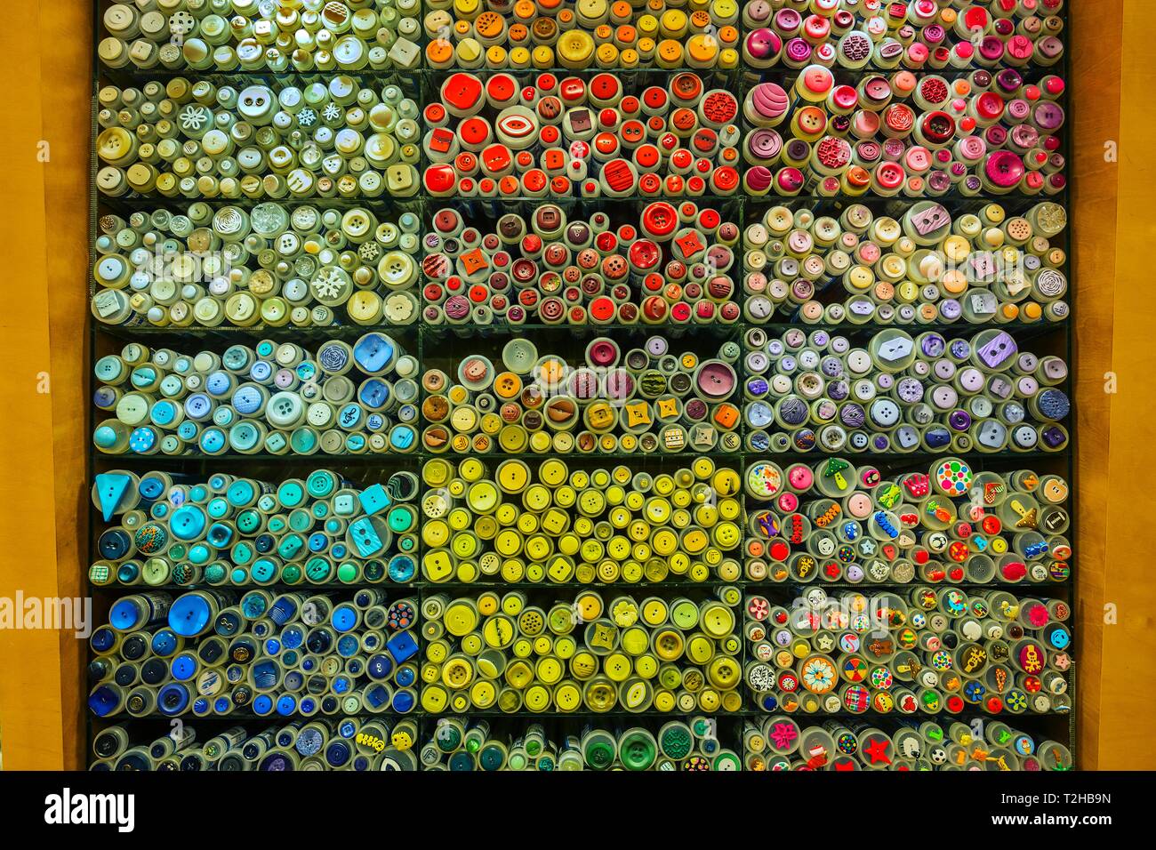 Shelf with button assortment, selection, many different colorful ...