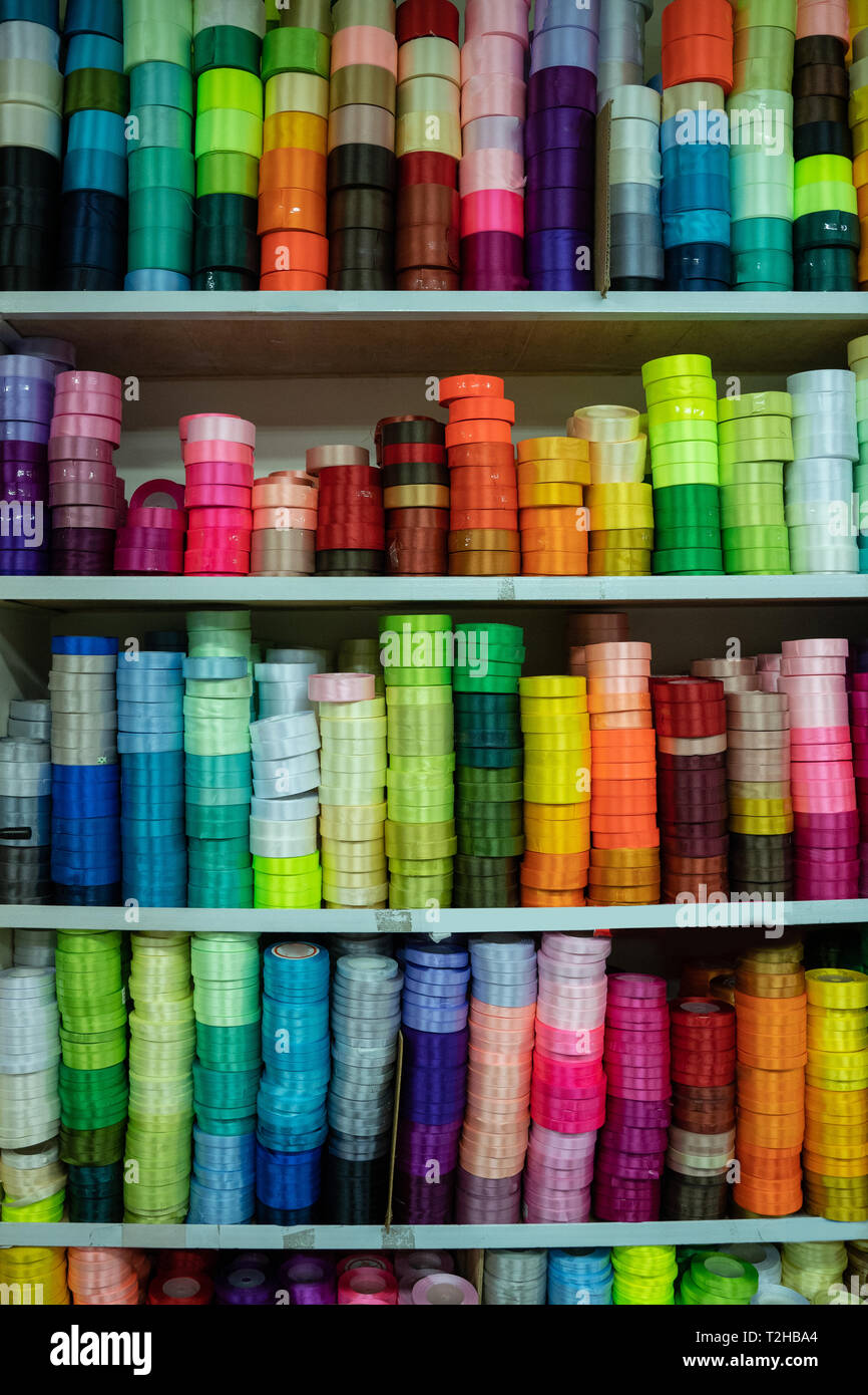 close up of stack of colorful ribbon on shelves Stock Photo - Alamy
