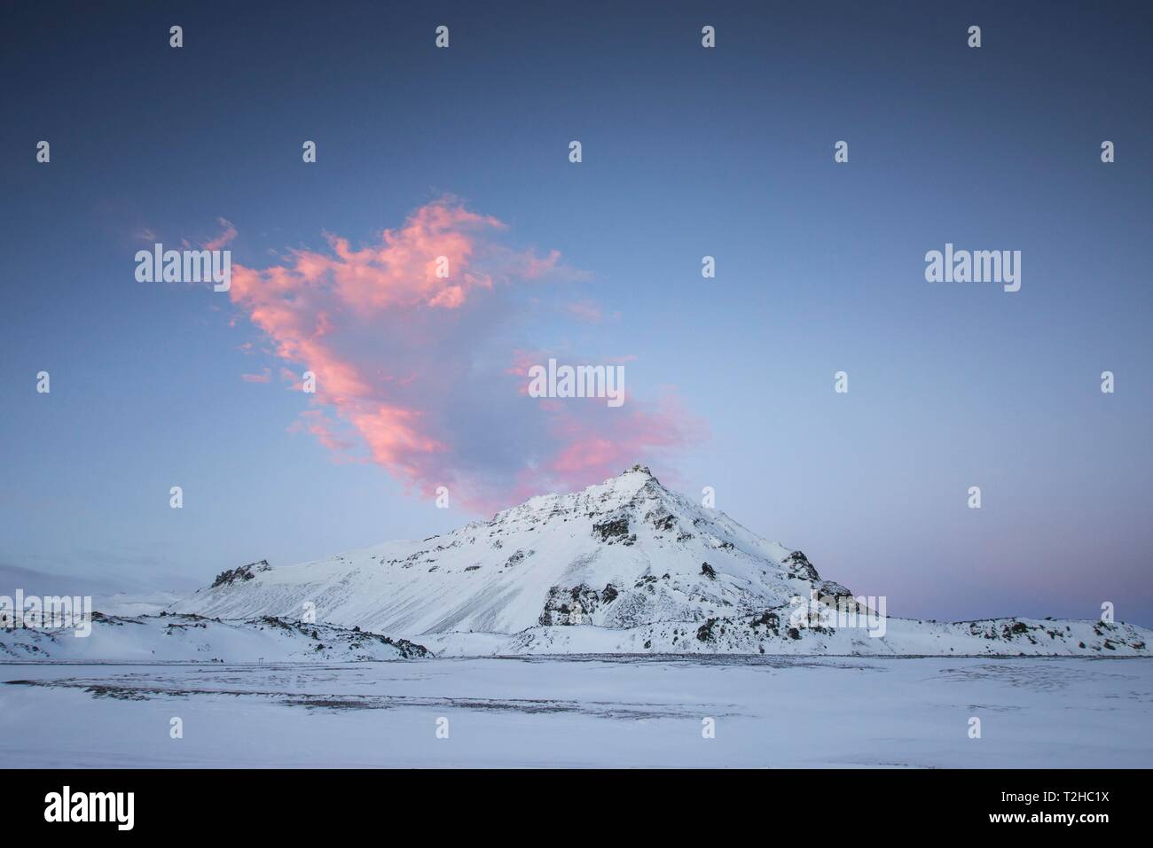 Snowy landscape, mountain with red cloud, south coast peninsula ...