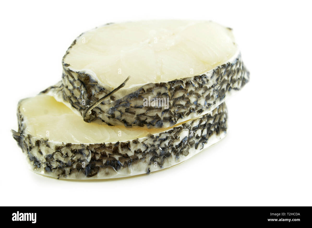 Pieces of raw cod fish fillets on white background Stock Photo - Alamy