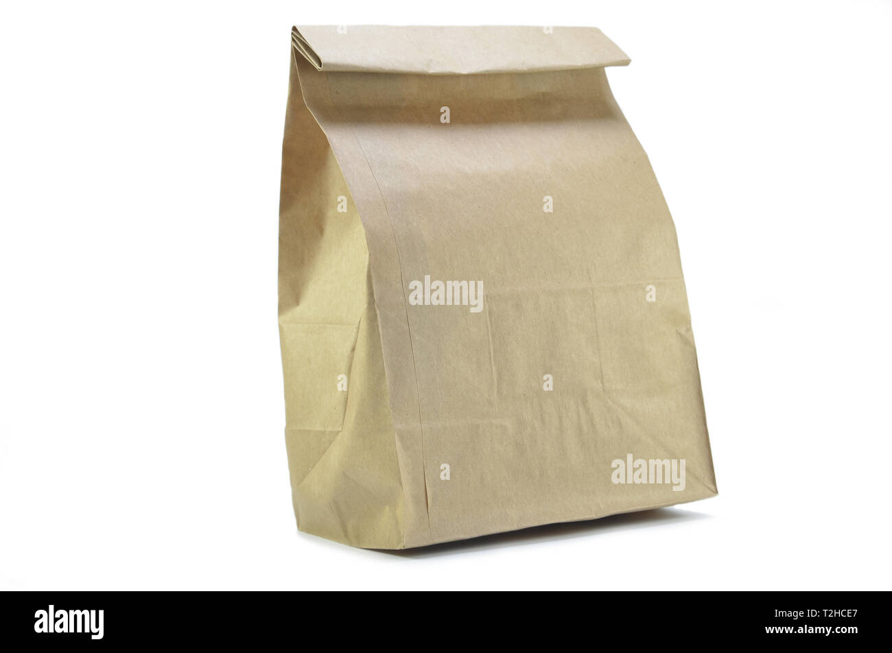Brown paper package isolated on a white background Stock Photo - Alamy