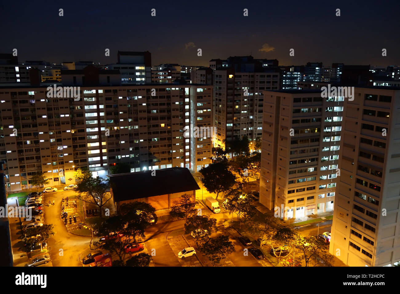 Singapore Public Housing HDB flats. Landscape at night Stock Photo - Alamy