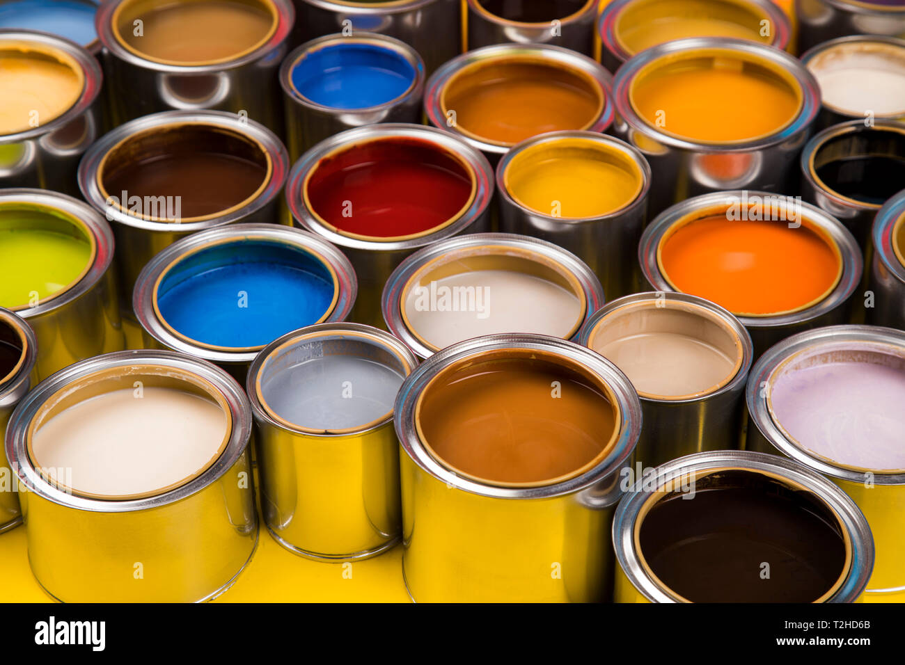 Group of Brush, tin metal cans with color paint Stock Photo - Alamy