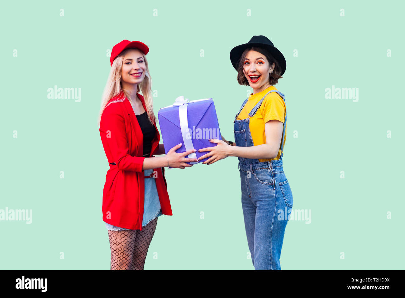 Bright holiday of lovely friends. Portrait of two beautiful happy ...