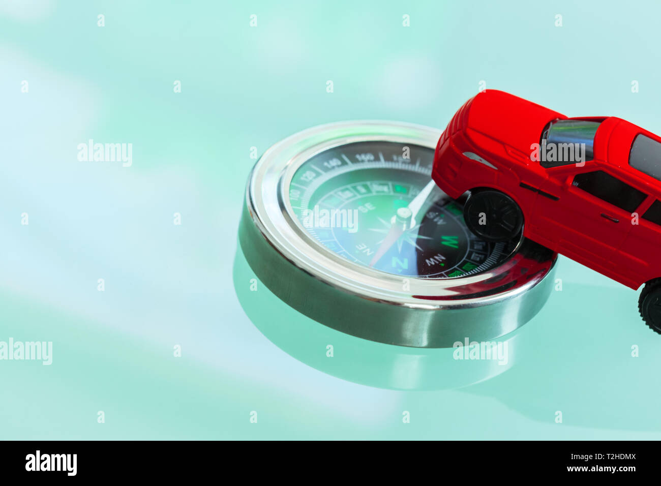 compass and model of the automobile Stock Photo - Alamy