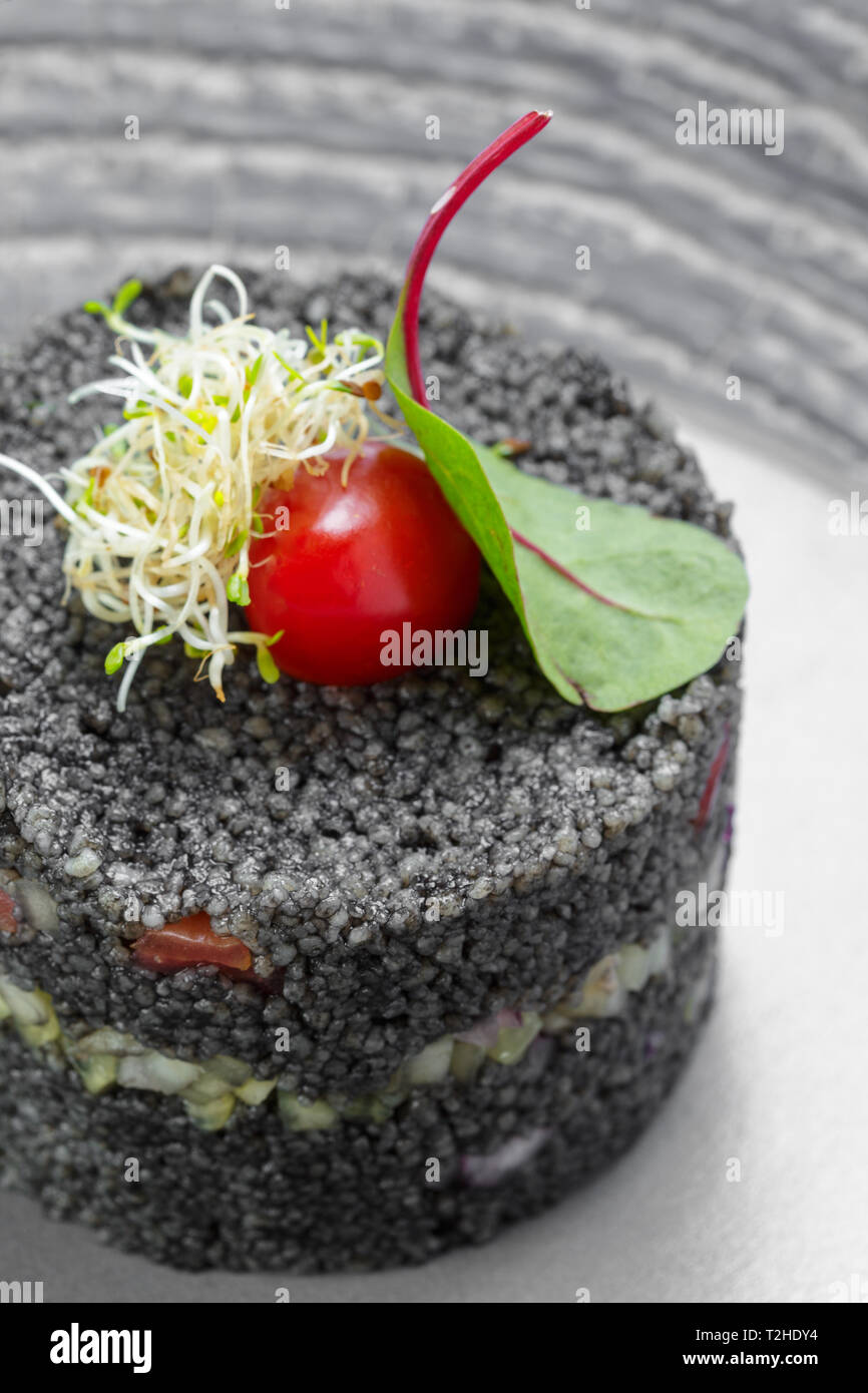 Black rice risotto Stock Photo - Alamy