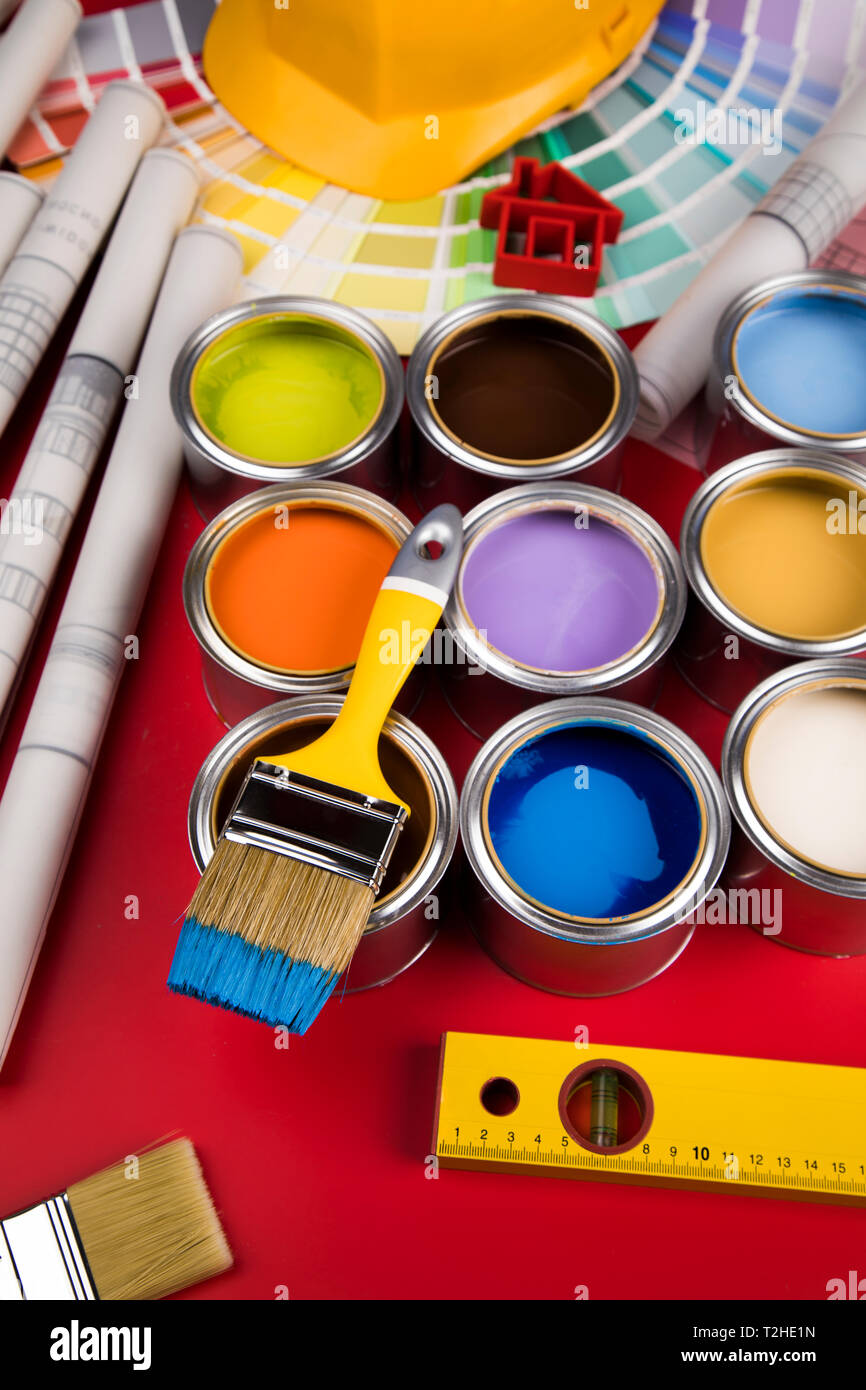 Collection of colored paints cans, Brush, red background Stock Photo ...