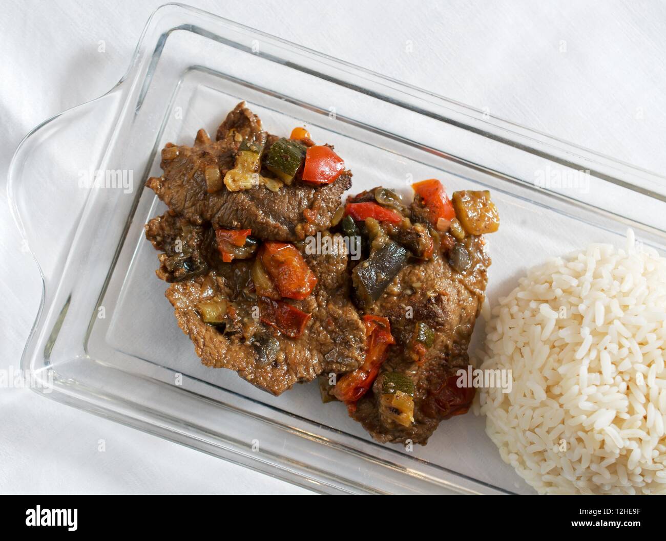 Dish with beef, tomatoes and vegetables, rice, African cuisine, Senegal ...