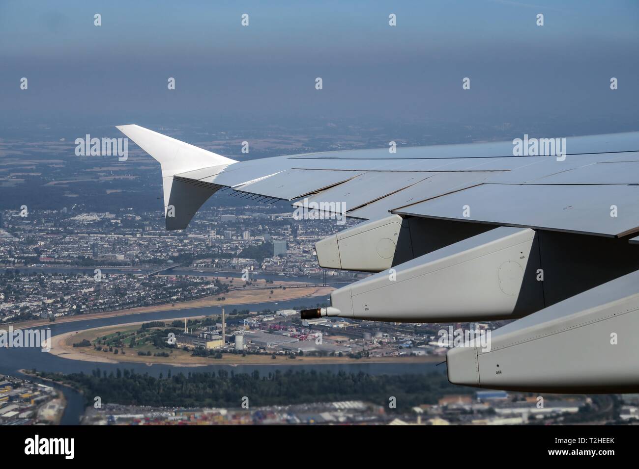 Wing of a passenger aircraft after take off via dusseldorf hi-res stock ...