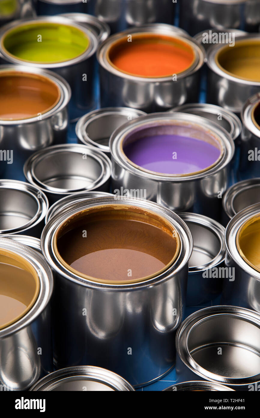 Metal cans with color paint Stock Photo - Alamy