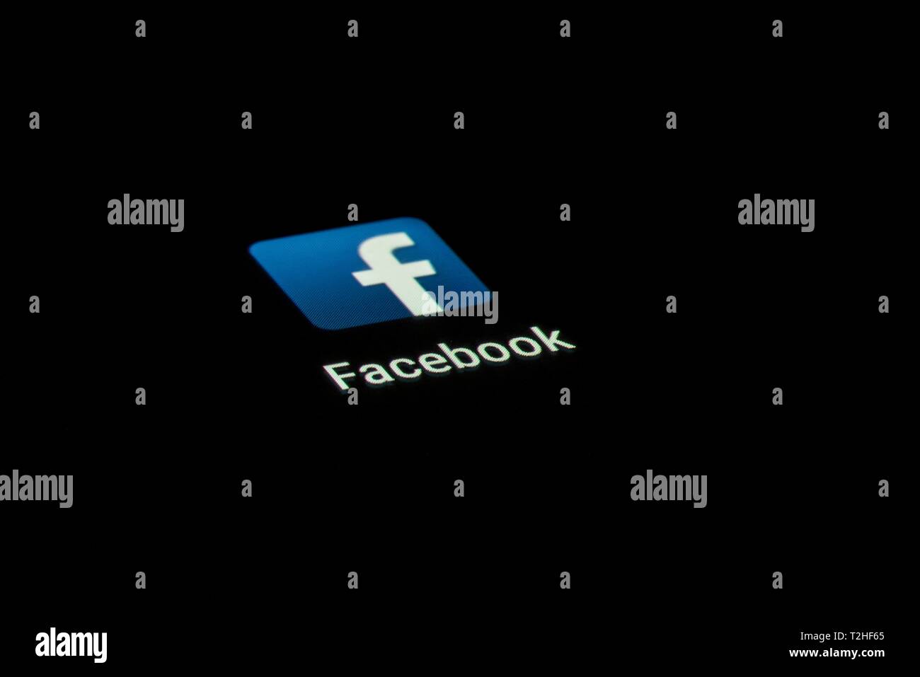Facebook app icon on a display, social network, social media, mobile ...