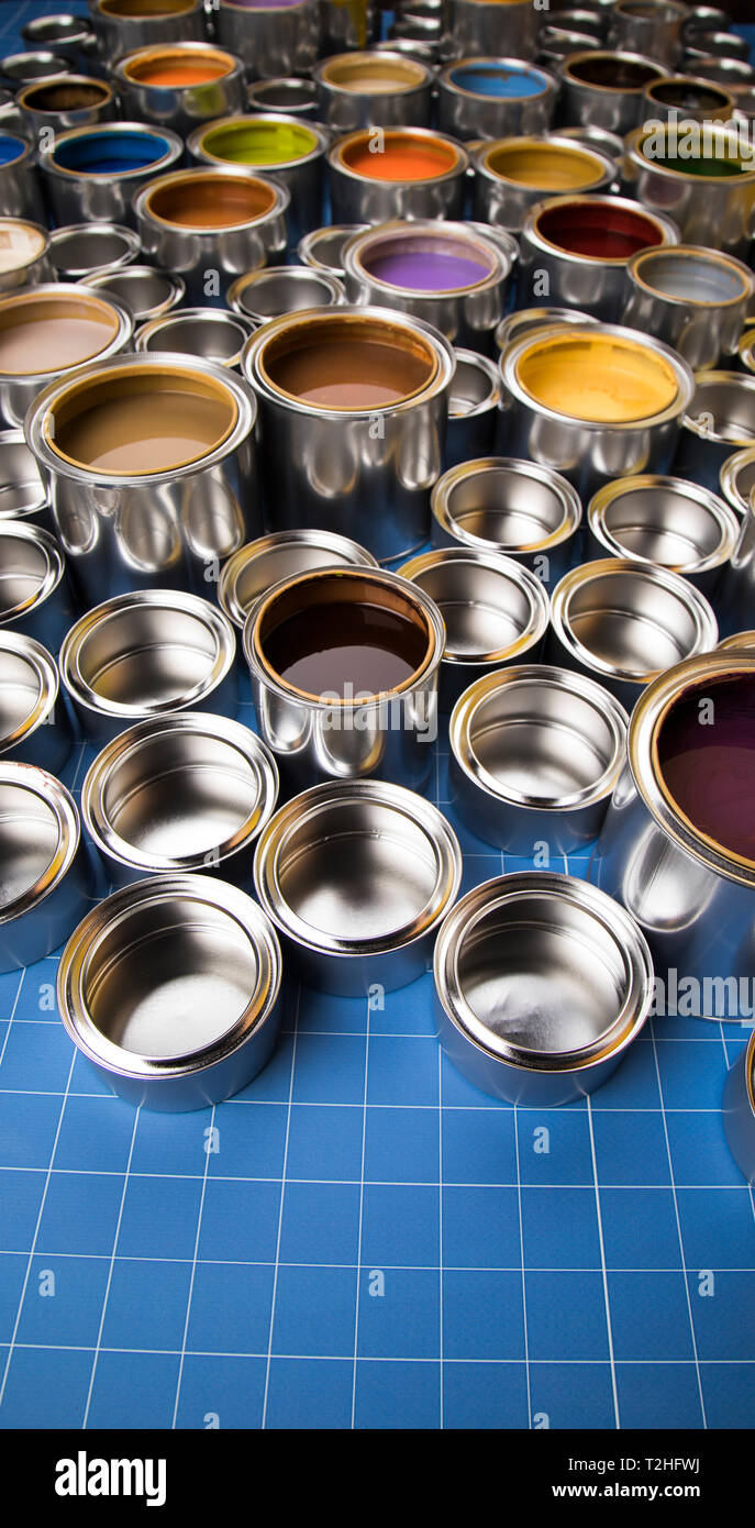 Metal cans with color paint Stock Photo - Alamy
