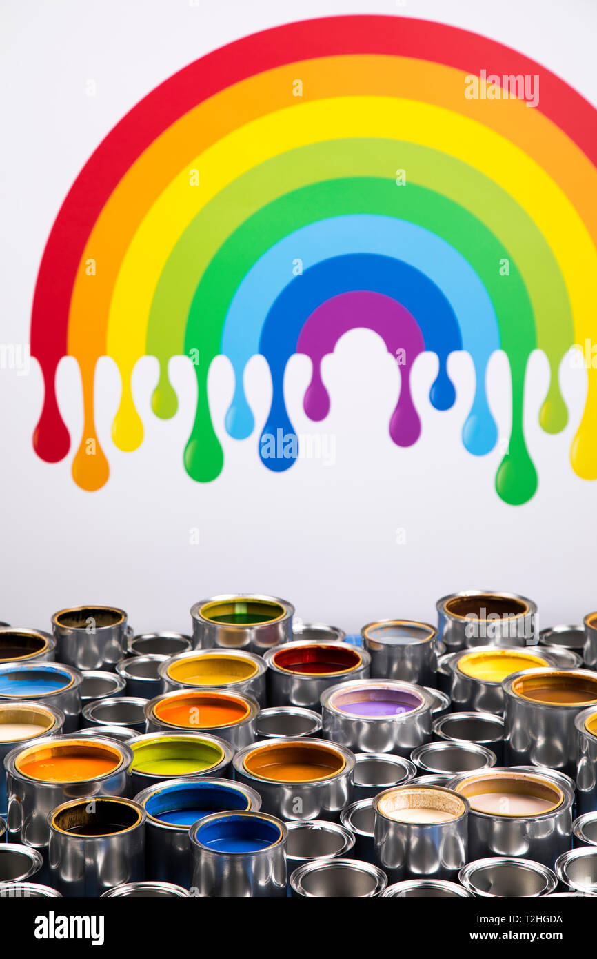Rainbow, tin metal cans with color paint Stock Photo - Alamy