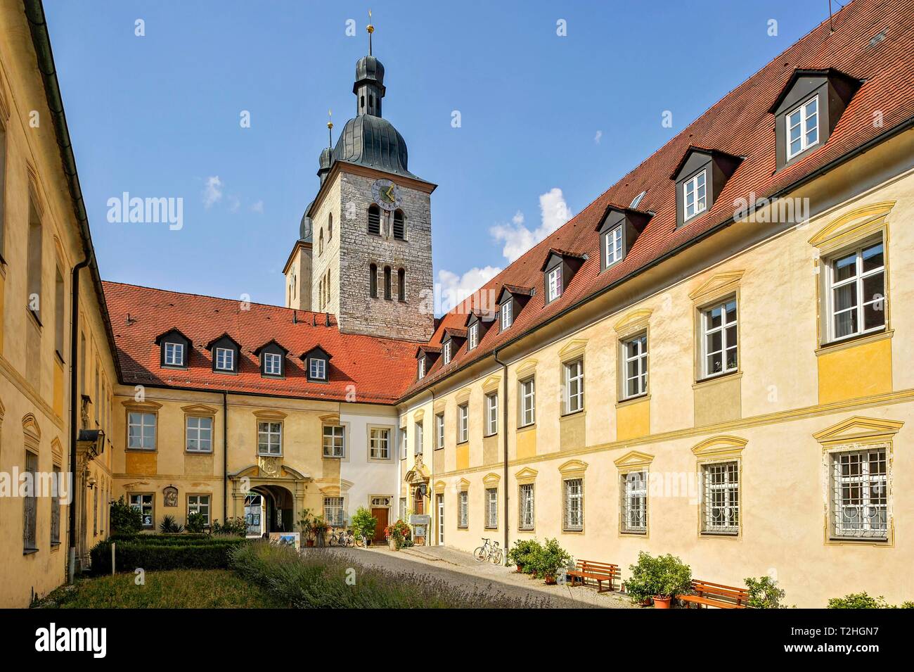 Romanesque monastery church, house St. Gregor with monastery gate ...
