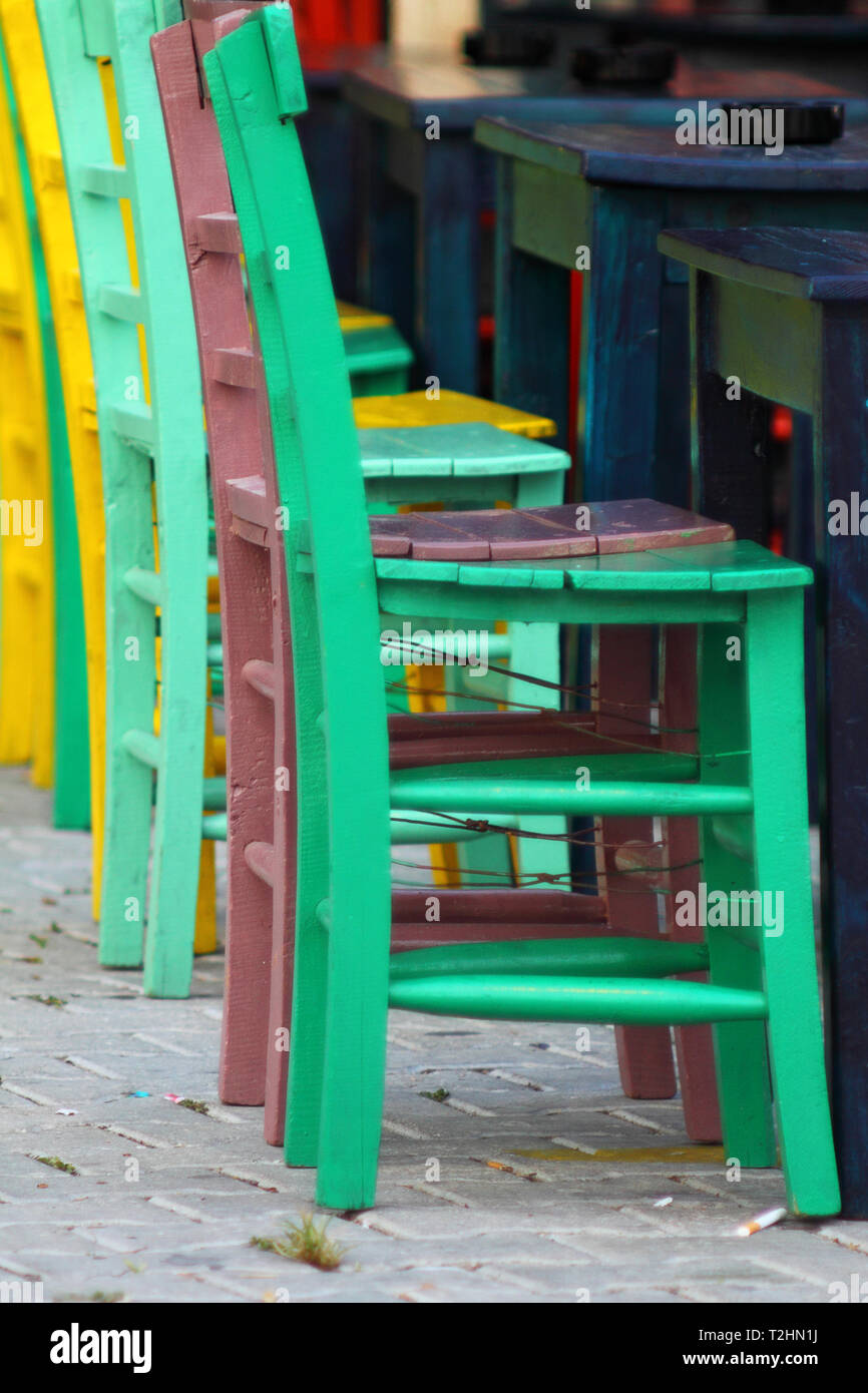 side by side chairs. colorful chair. Antalya Turkey Stock Photo - Alamy
